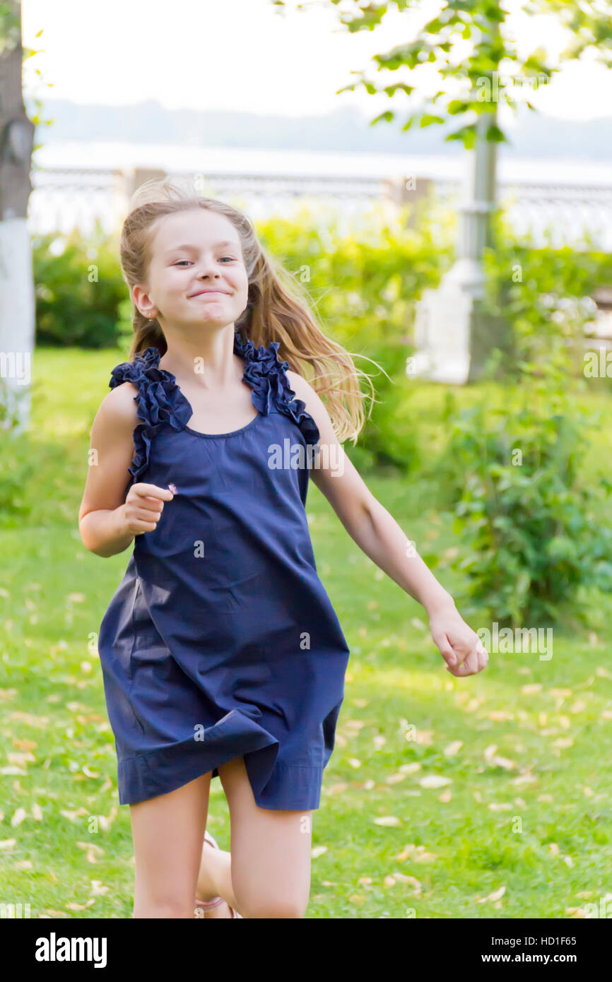 Running in green grass hi-res stock photography and images - Alamy