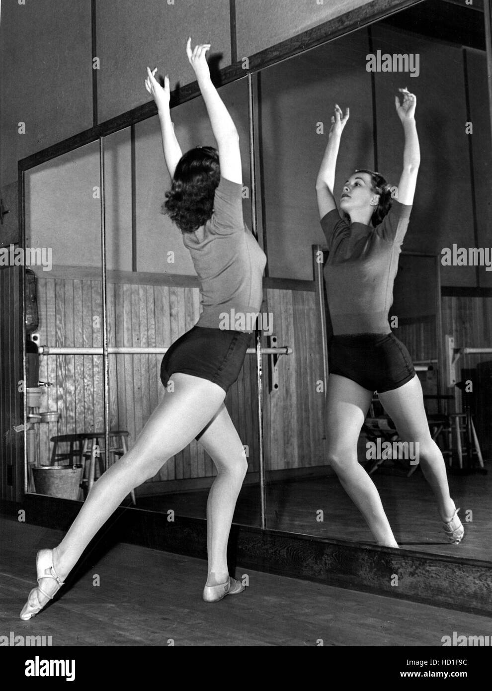 ELEANOR POWELL, rehearsing for her "Flame Ballet" number in the film ...
