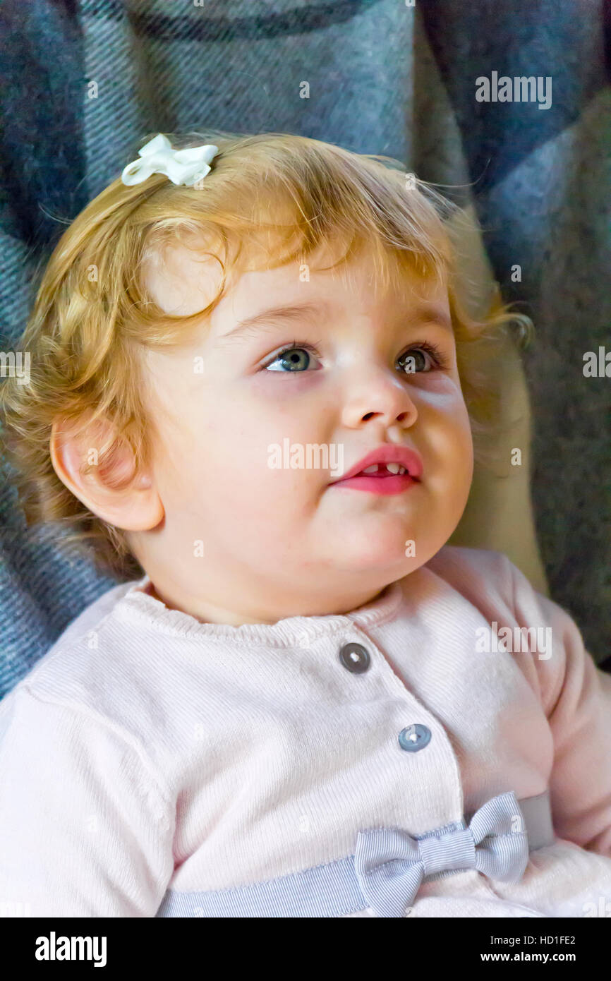Caucasian beautiful cute infant girl in pink Stock Photo - Alamy