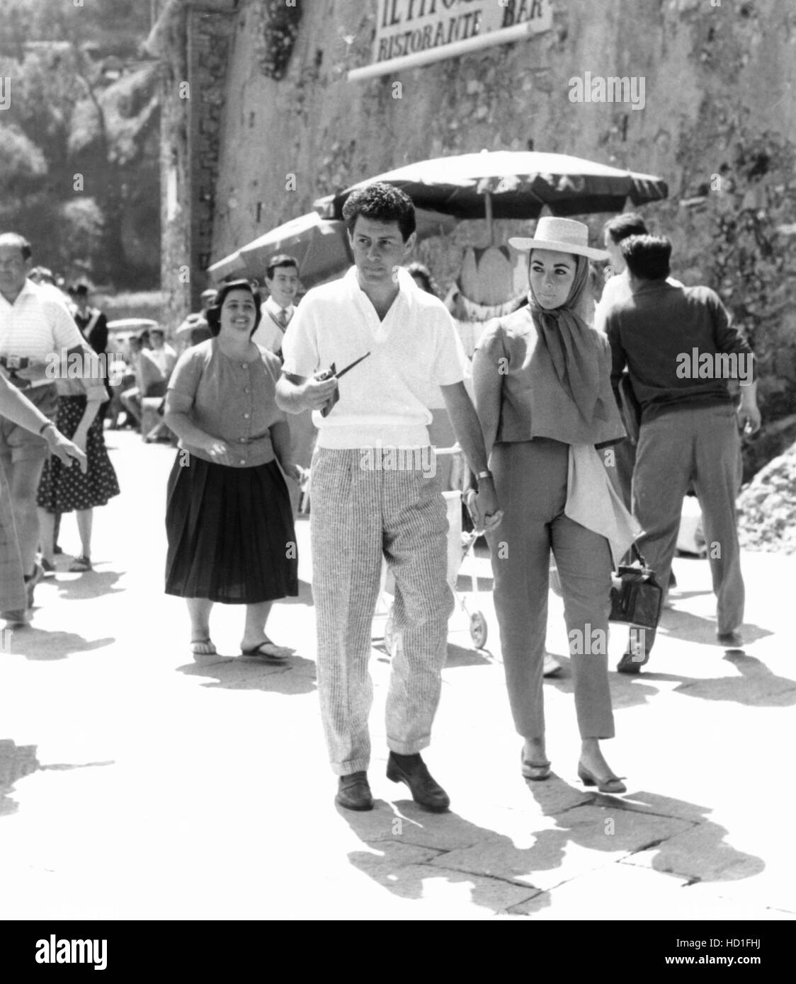 From left, Eddie Fisher, Elizabeth Taylor, in Rome for the shooting of ...