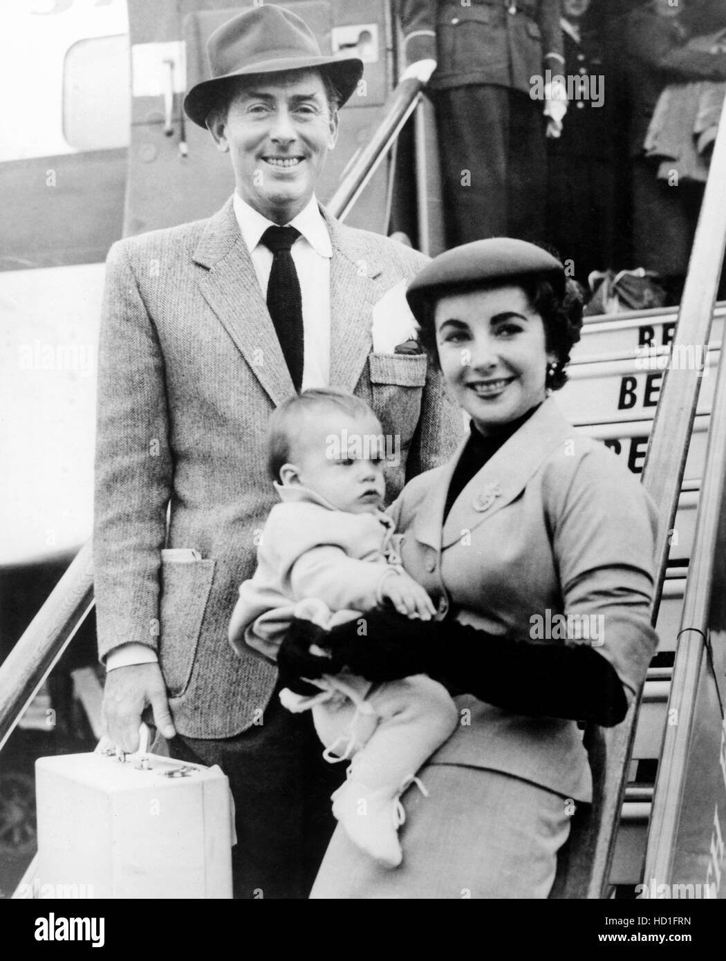 From left, Michael Wilding, Elizabeth Taylor, with their son Michael ...