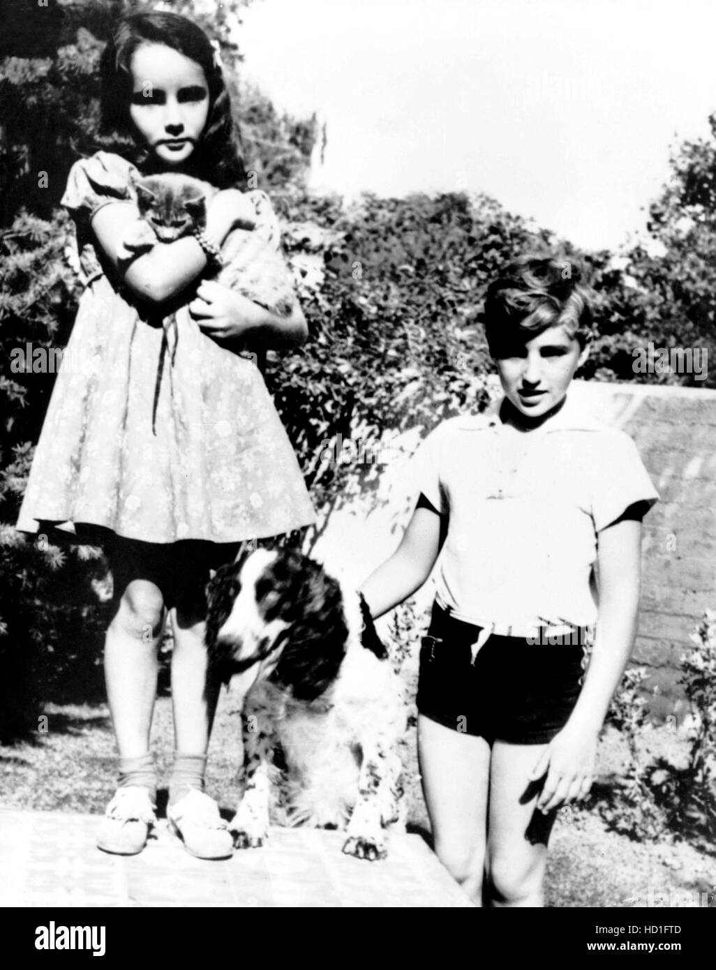 Six-year-old Elizabeth Taylor, left, and her brother, Howard Taylor, ca ...