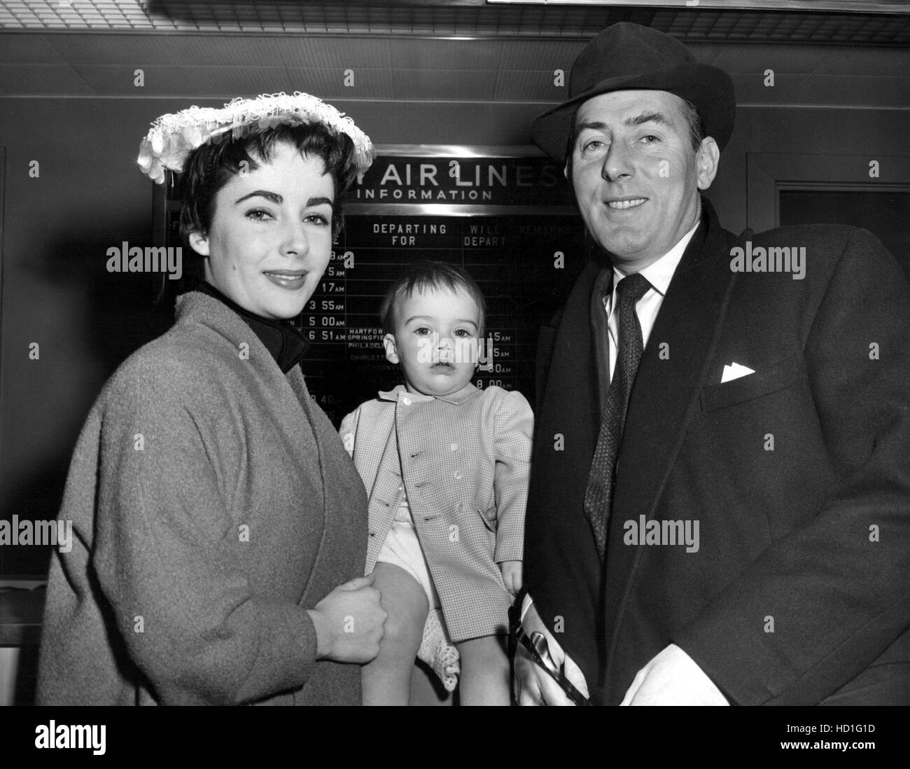 Elizabeth Taylor, Michael Wilding Jr., Michael Wilding about to board a ...