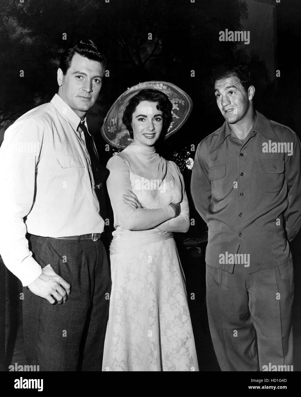 Rock Hudson, Elizabeth Taylor with visitor Rocky Marciano on the set of ...