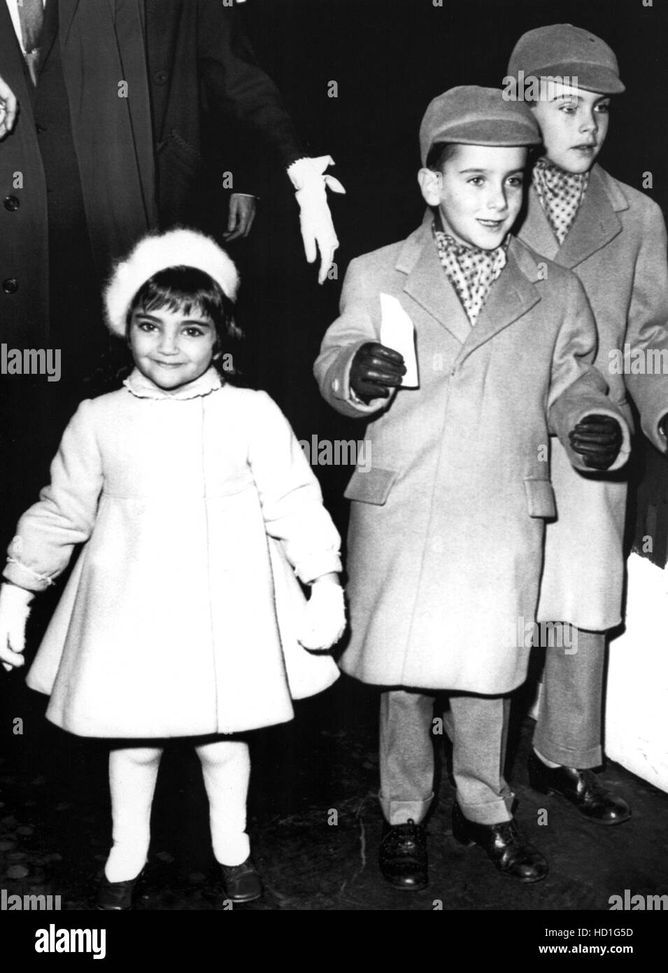 Liza Todd, Christopher Wilding, Michael Wilding Jr. arrive in New York ...