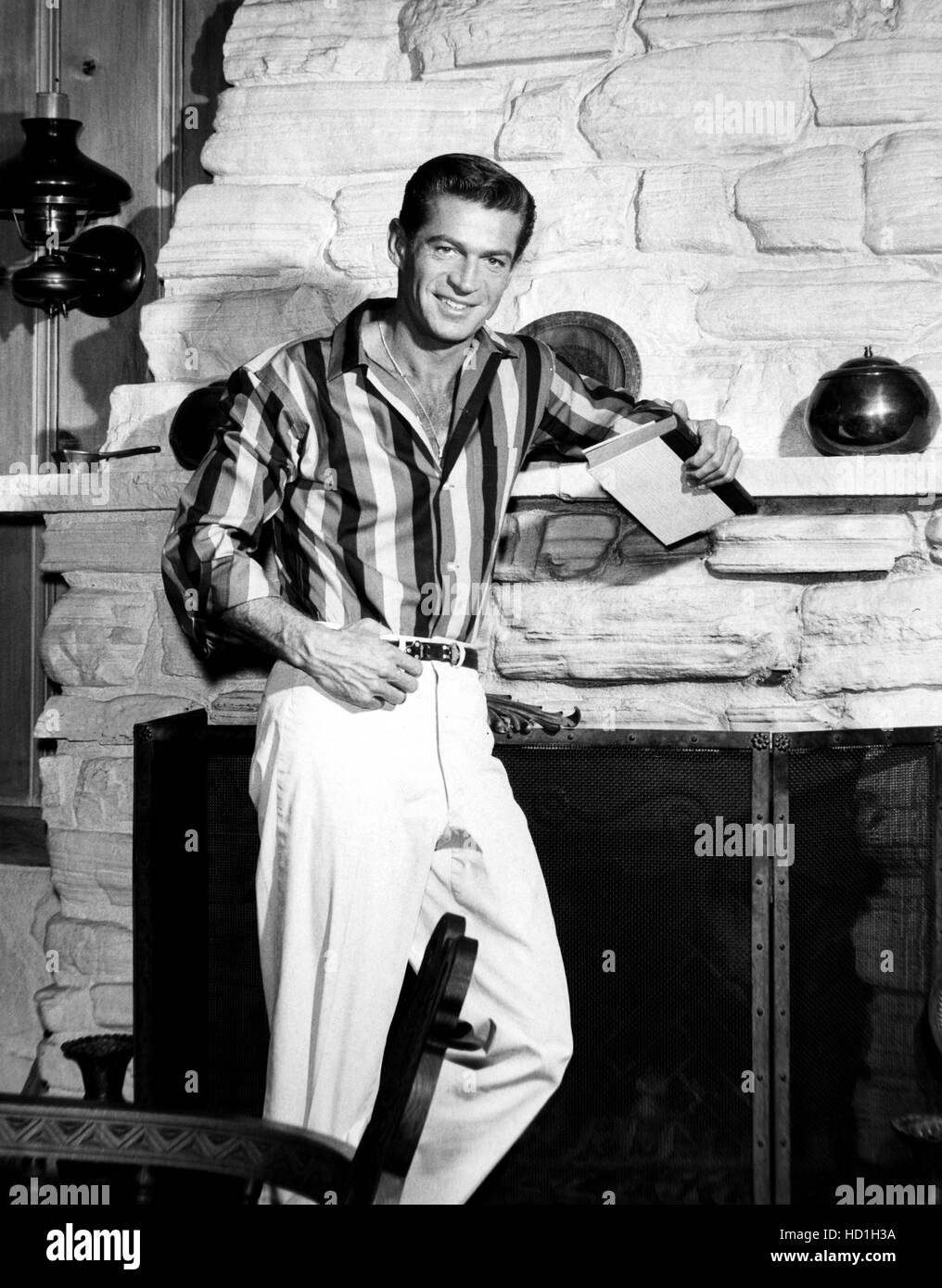 George Nader relaxing at home, ca. 1960 Stock Photo - Alamy