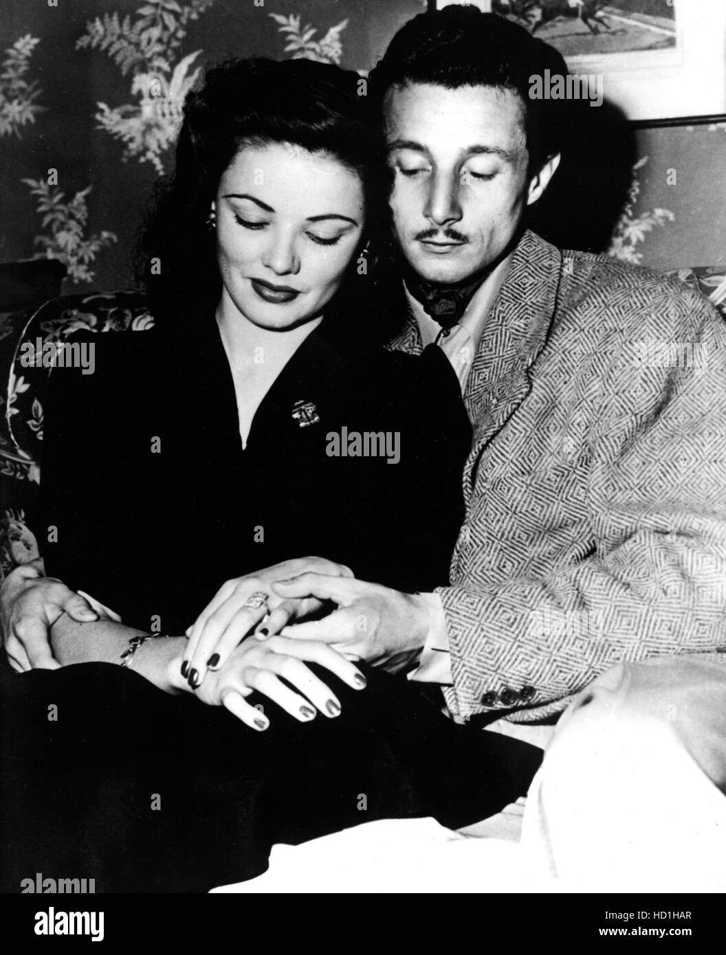Gene Tierney with husband Oleg Cassini in the early 1940s Stock Photo ...