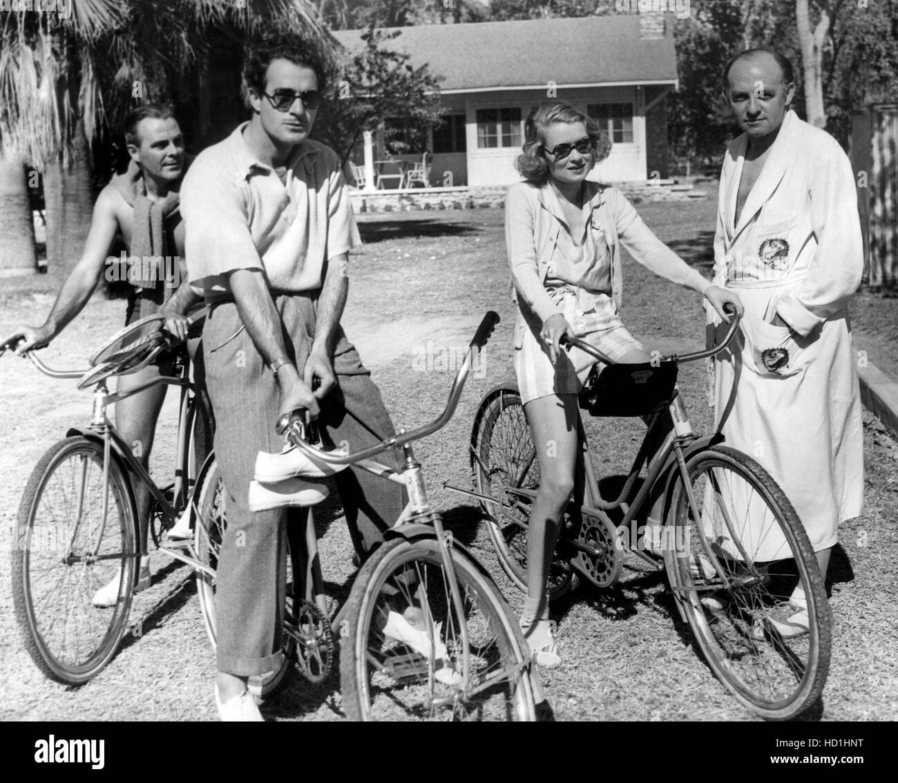From left: Warner Baxter, Gilbert Roland, Constance Bennett, Harry Cohn ...