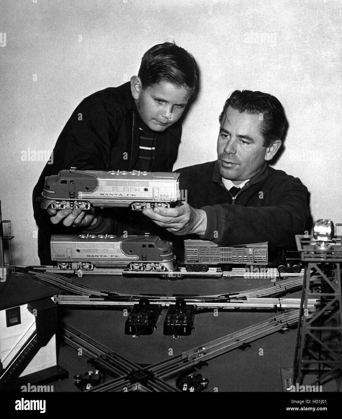 Model railroad enthusiasts PETER FORD and dad GLENN FORD check out ...