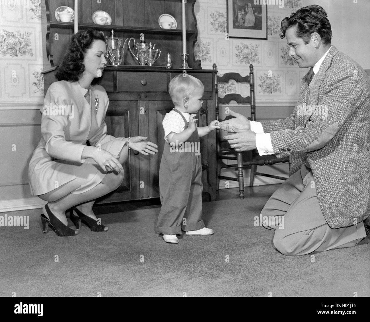 Eleanor Powell, (left) and Glenn Ford, helping son Peter Ford take his ...