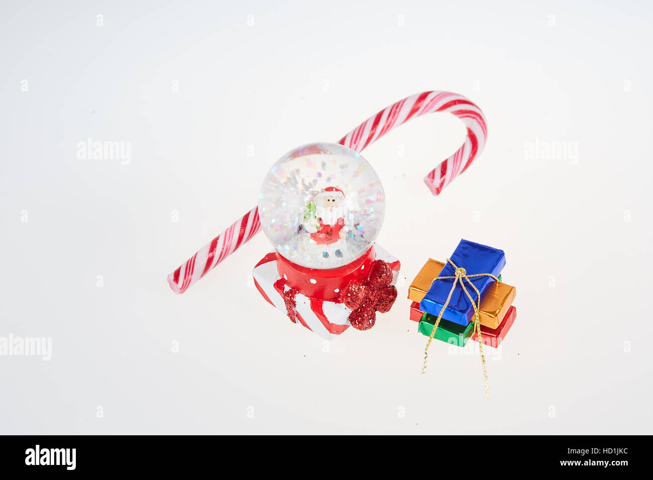 Candy stick christmas red balls isolated Stock Photo - Alamy