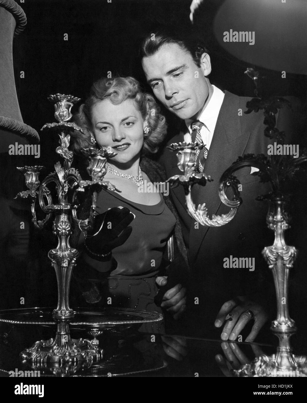 From left: Jeanne Cagney, Kim Spaulding, looking at antique silver ...