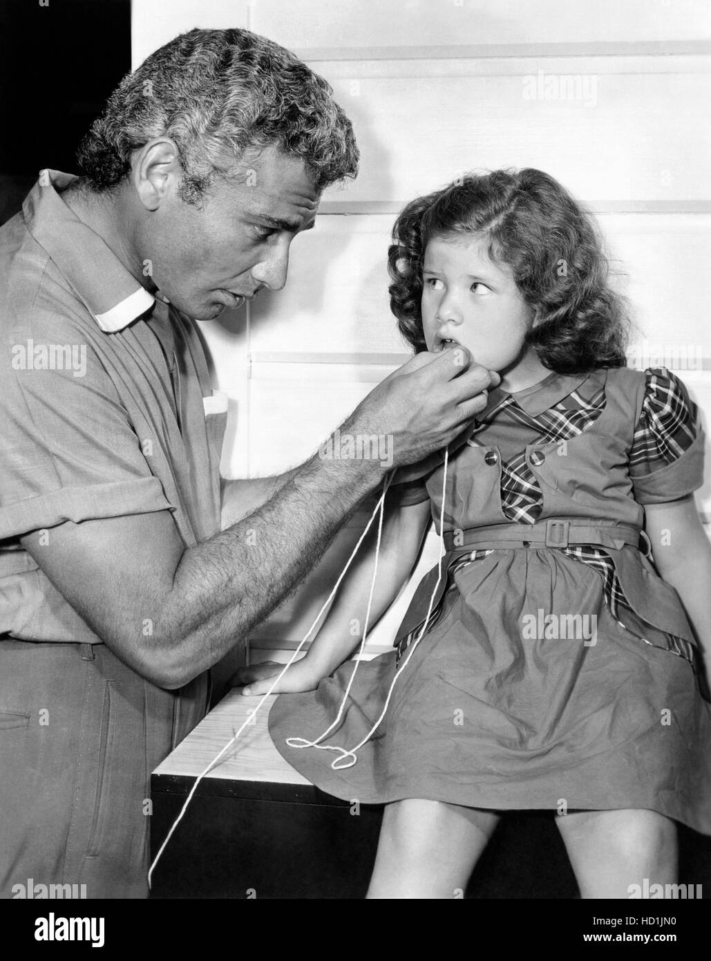 Jeff Chandler, about to extract the tooth of his understandably dubious ...