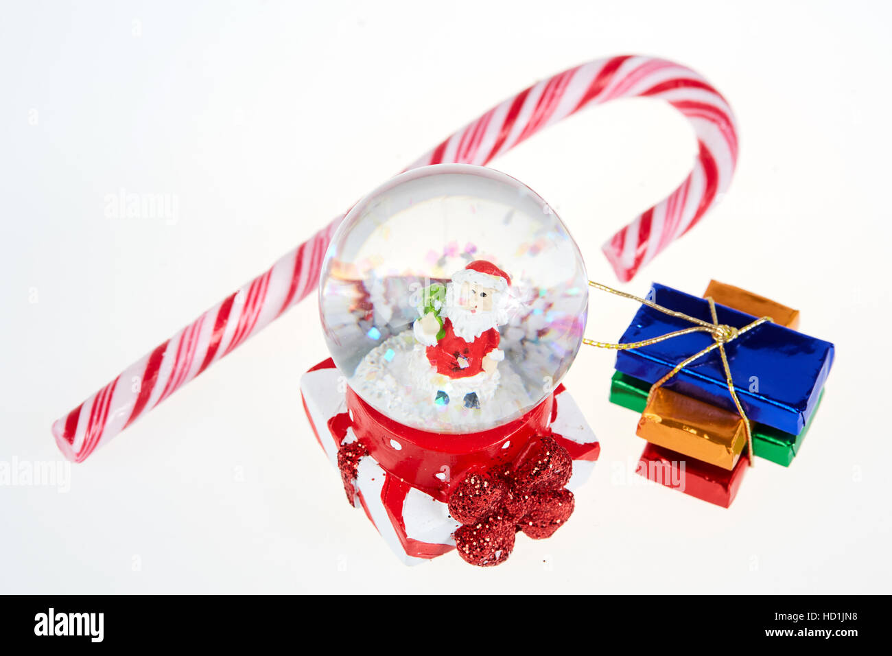 Candy stick christmas red balls isolated Stock Photo - Alamy