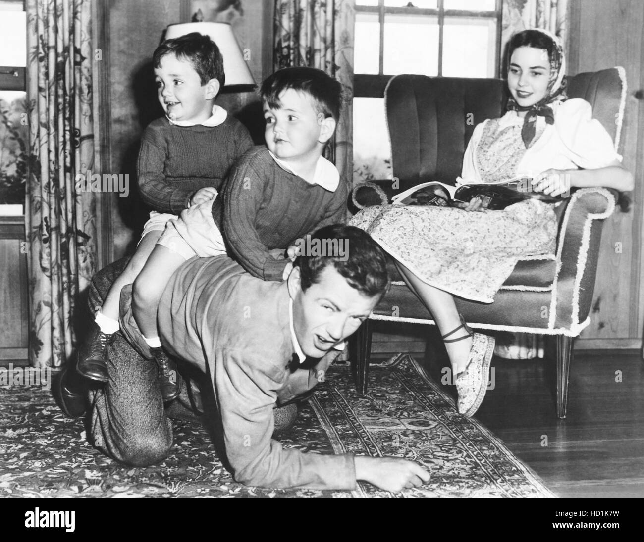 Jennifer Jones, right, and Robert Walker, at home with their sons, from ...