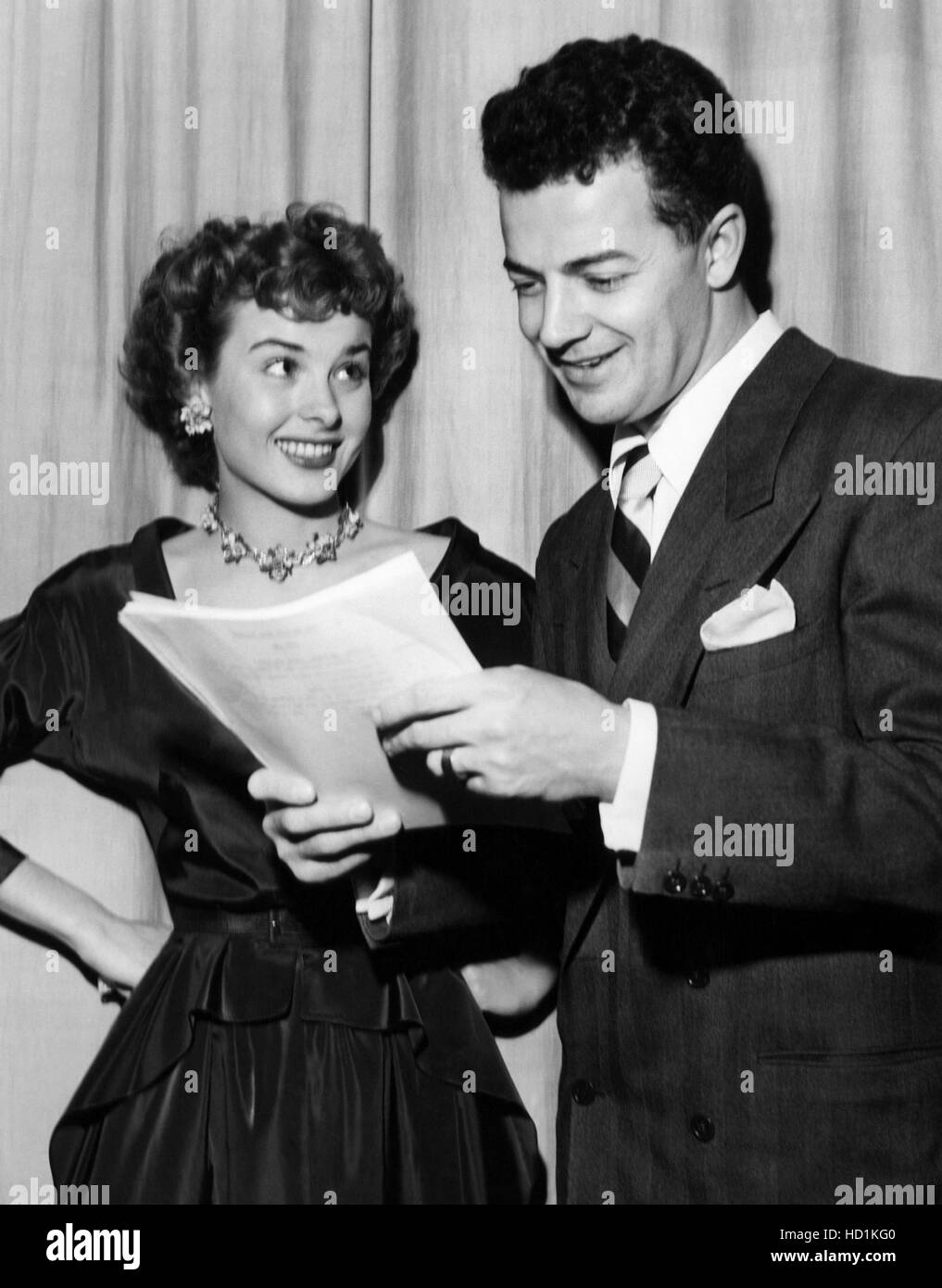 Jean Peters, Cornel Wilde, rehearsing a LUX RADIO THEATRE presentation ...