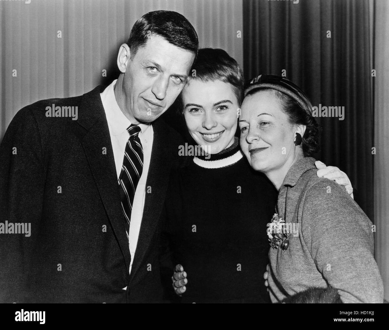 Jean Seberg with her mother and father at United Artist office after ...