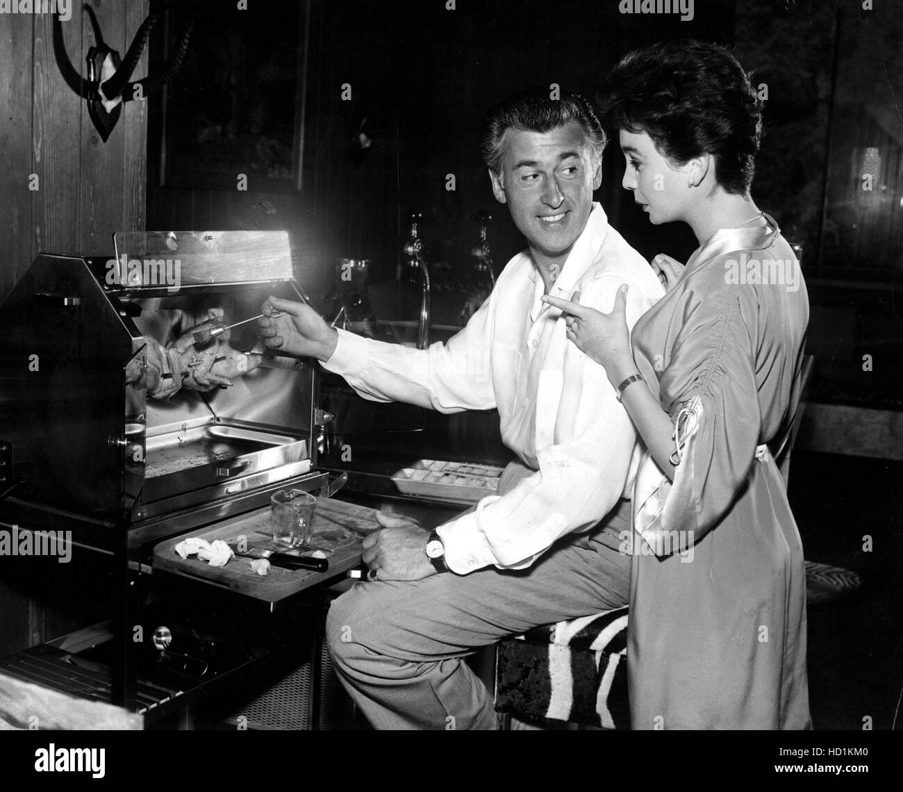 JEAN SIMMONS, with husband Stewart Granger, candid at home circa 1954 ...