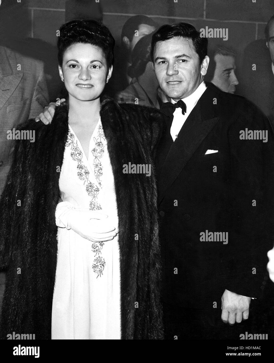 JOHN GARFIELD, with wife at the premiere of "They Can't Get You Down ...