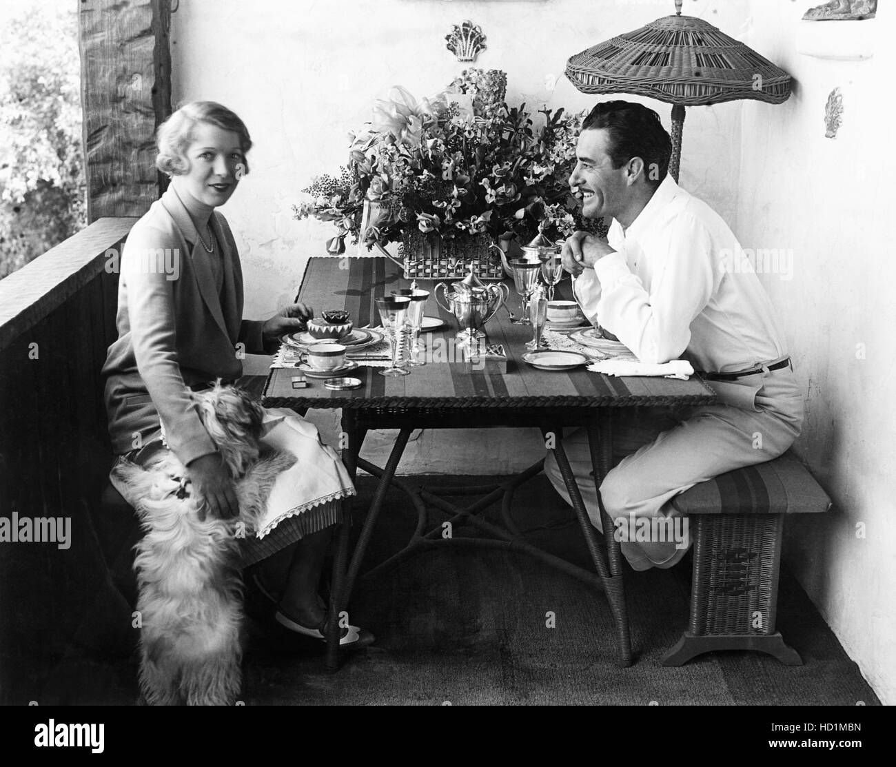 From left, Ina Claire, John Gilbert, at home, ca. 1929 Stock Photo - Alamy