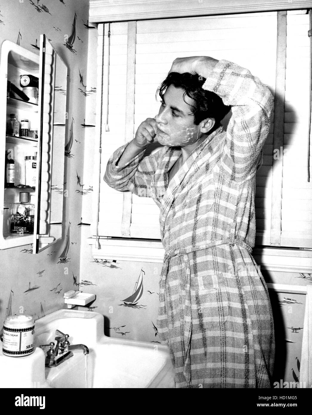 John Hodiak shaving at home, Beverly Hills, California, 1944 Stock ...