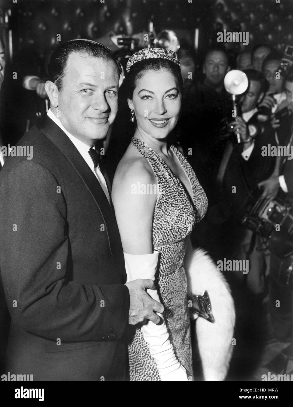 Director JOSEPH L. MANKIEWICZ escorts his leading lady AVA GARDNER to ...