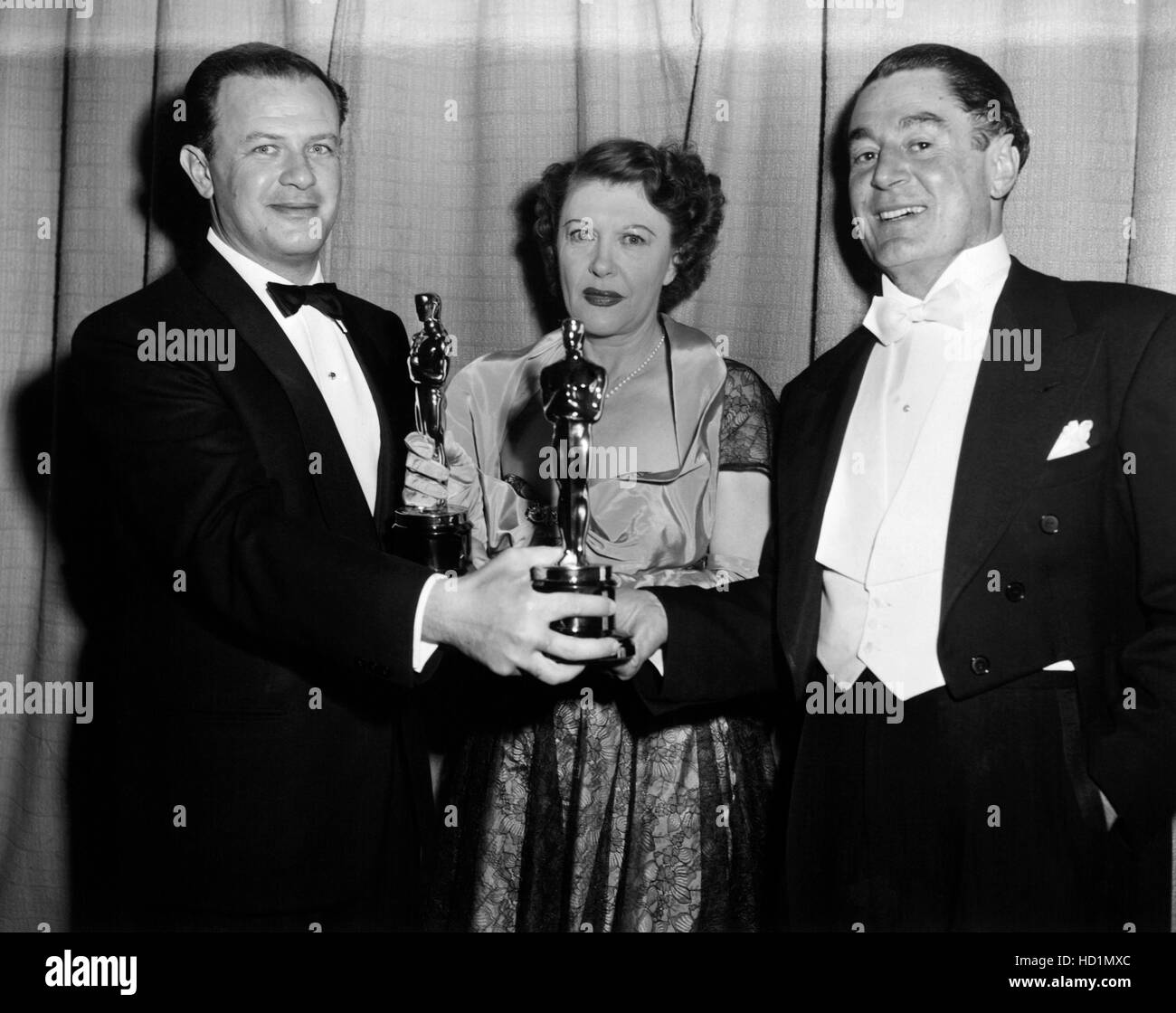 Joseph L. Mankiewicz presented Academy Awards for screenplay and ...