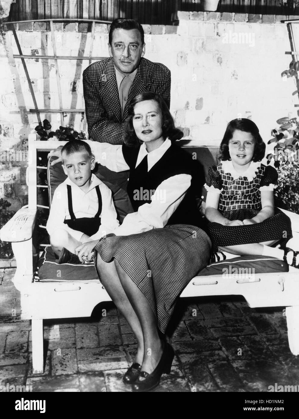 Leon Ames, and his wife, Christine, with their children, Leon, Jr., and ...