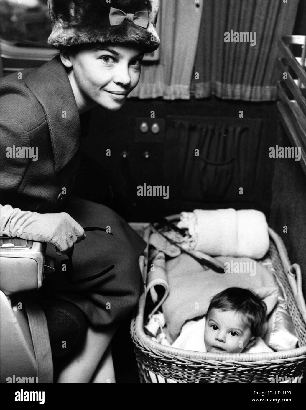 Leslie Caron and son Christopher arriving at TWA, 1957 Stock Photo - Alamy