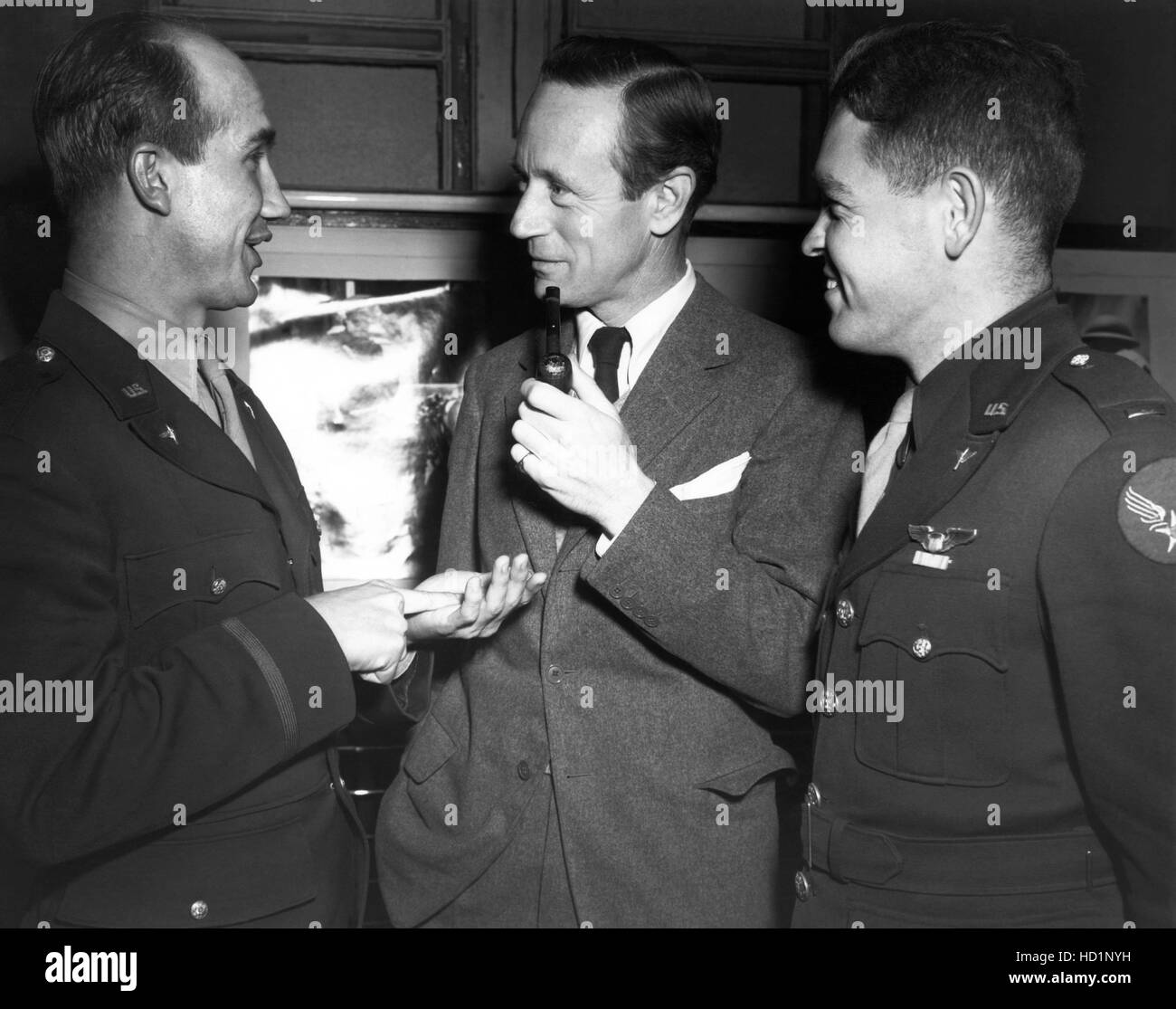 Leslie Howard (center) with Captain Kenneth C. Chatwin, Lieutenant John ...
