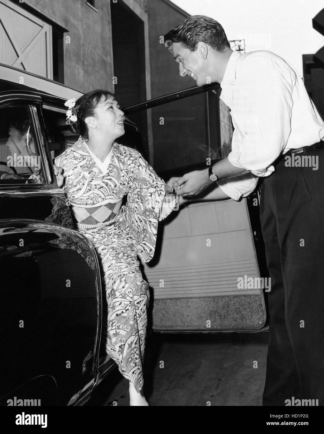Japanese actress Machiko Kyo, left, with Leslie Nielsen, on the MGM ...