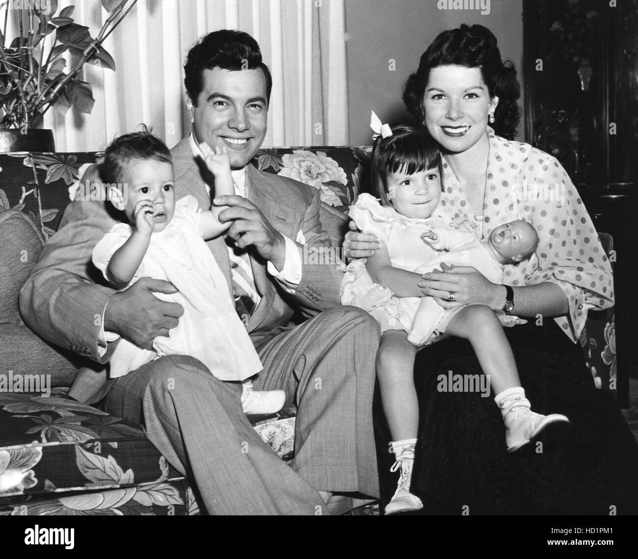 From left: Mario Lanza with daughter Elissa Lanza on lap, Betty Lanza ...
