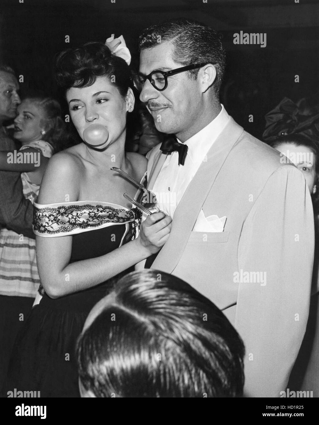 The always-elegant Marie McDonald, left, with Harry Karl, at Ciro's, ca ...