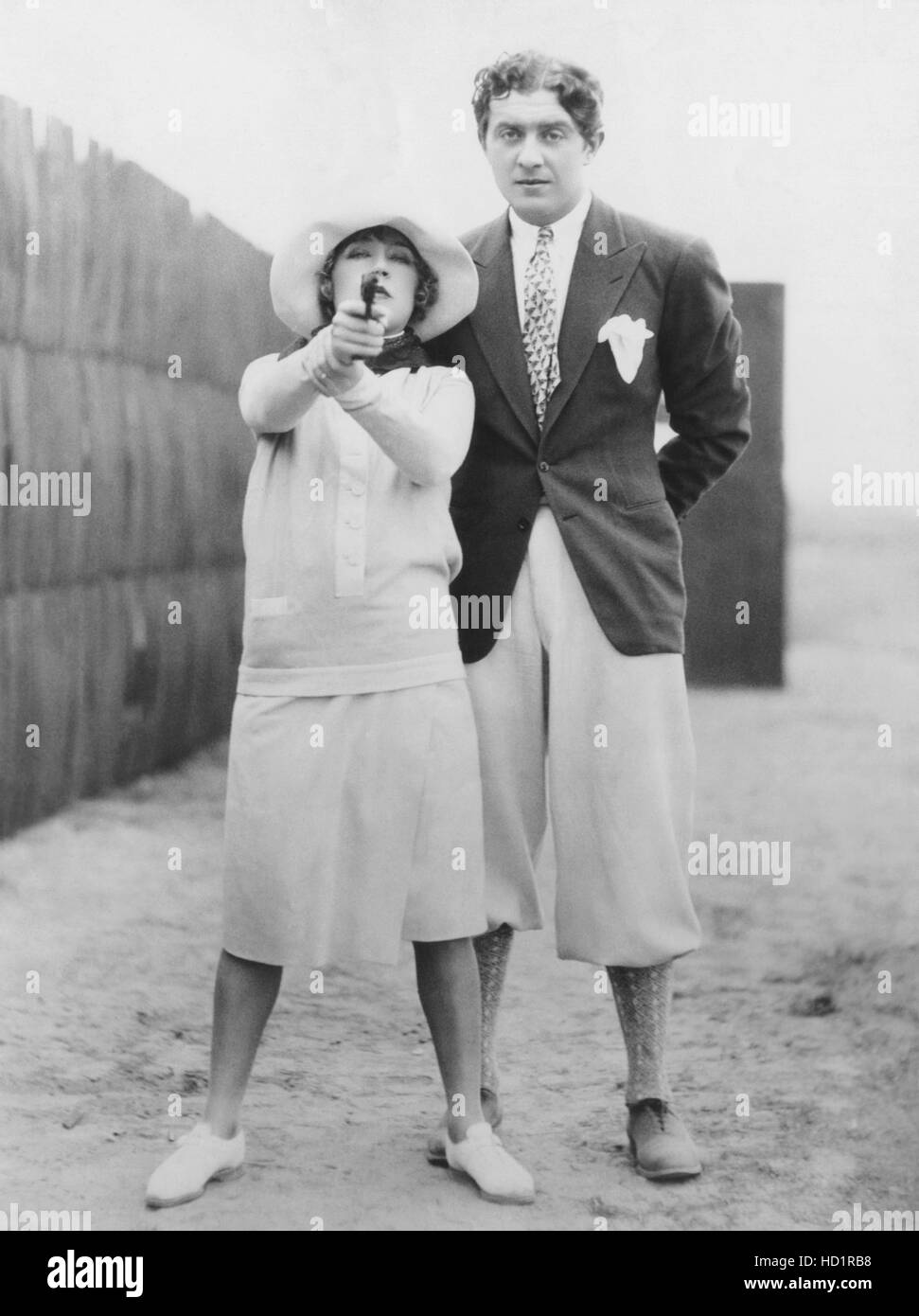 From left: Mae Murray, Prince David Mdivani engaged in some target ...
