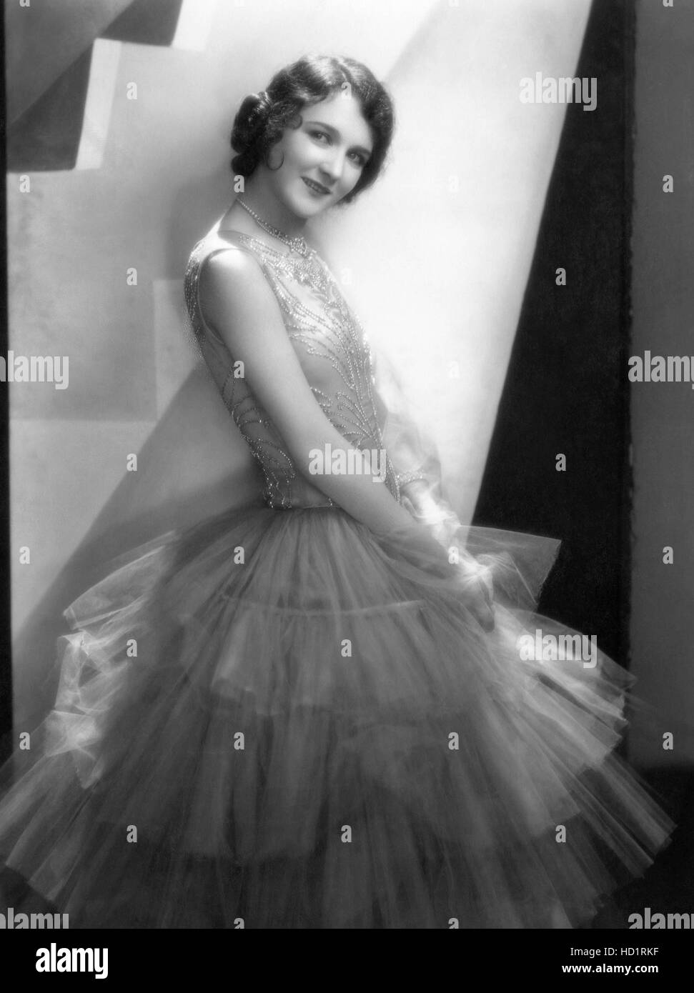 Mary Philbin, modeling a rose-tulle gown with jeweled bodice, 1929 ...