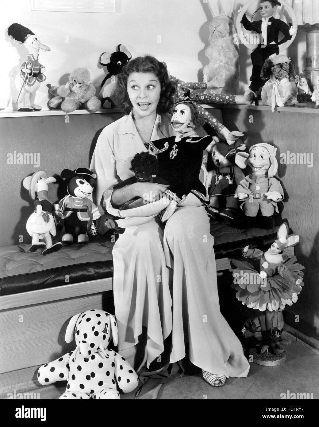Martha Raye posing with her doll collection at Laurel Canyon home in ...