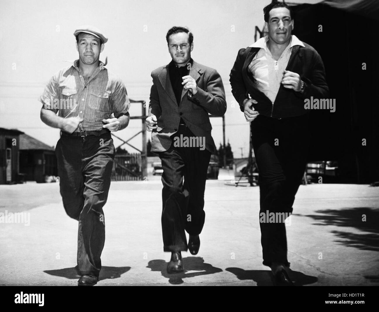 From left, 'Slapsie' Maxie Rosenbloom, director William Wellman, boxer ...