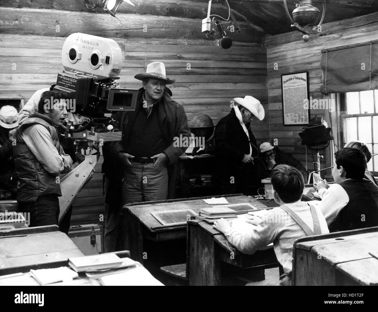 Mark Rydell directing John Wayne and child actors, on the set of THE ...