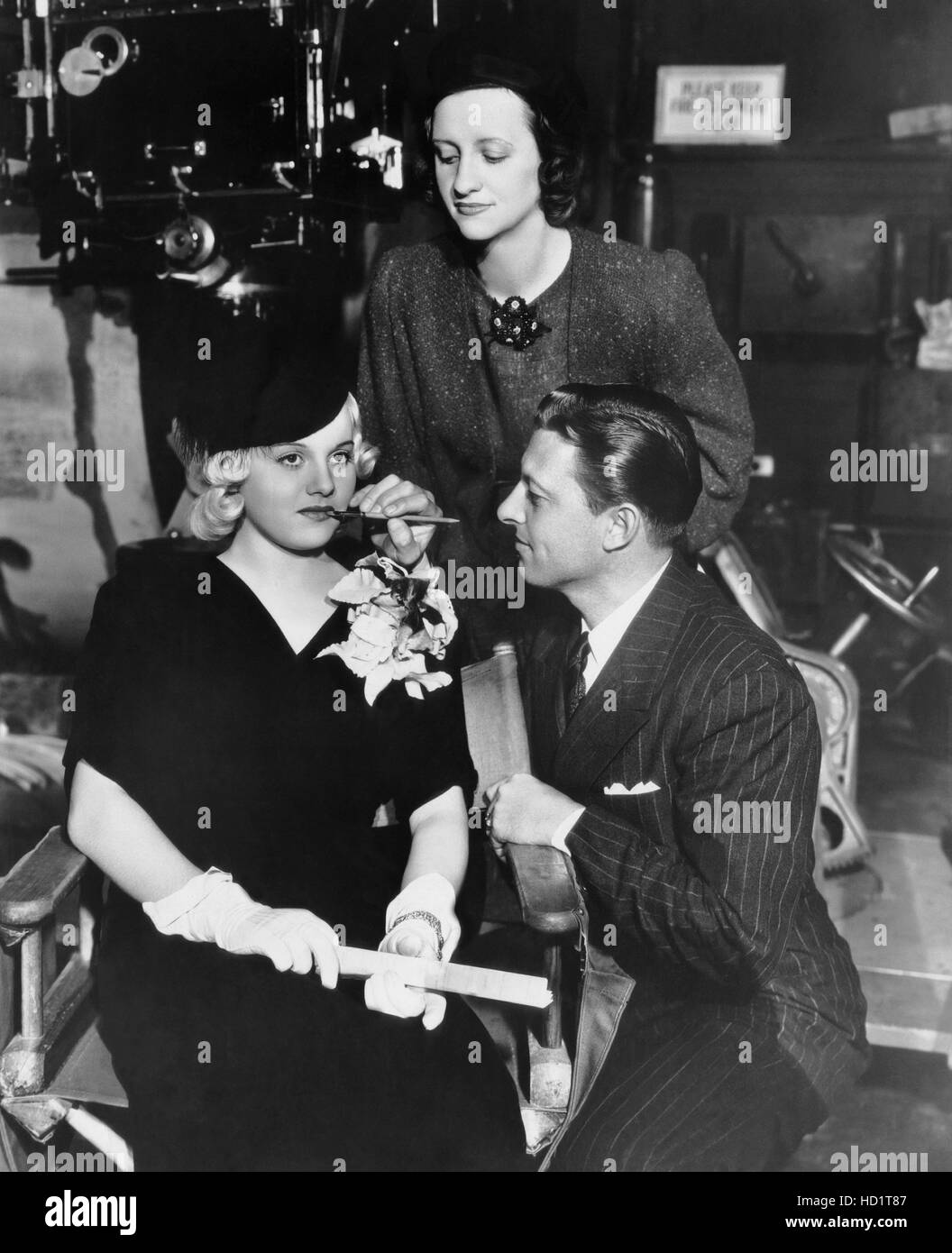 Olympe Bradna, being made up by Wally Westmore while trainee Mary ...