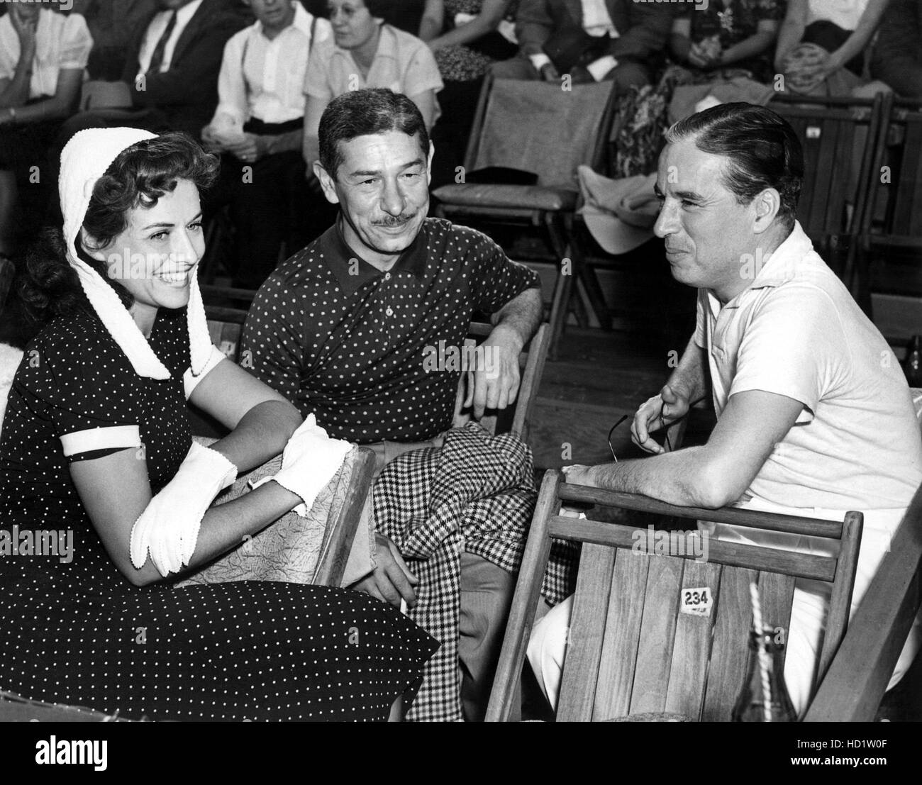 Sitting crossed legs Black and White Stock Photos & Images - Alamy