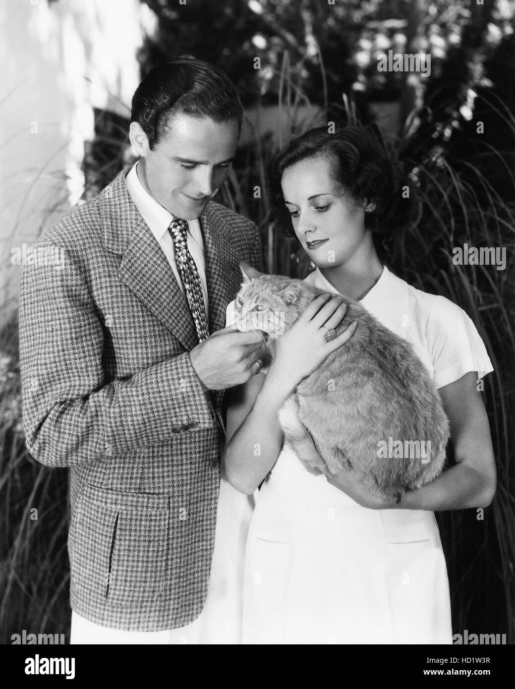 Patric Knowles, left, and his wife, actress Enid Percival, at home ...