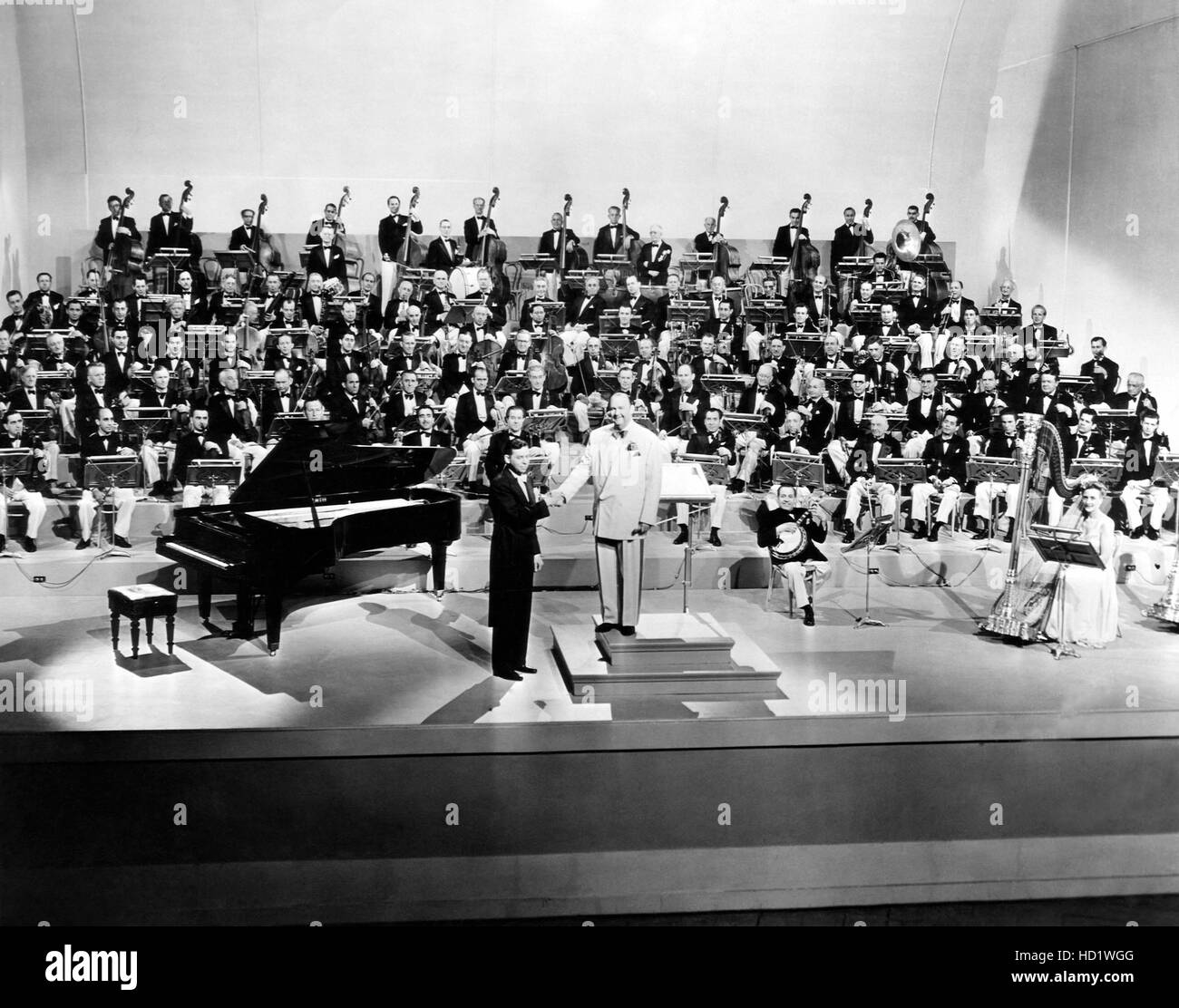 Paul Whiteman greets Oscar Levant as the Paul Whiteman Orchestra ...