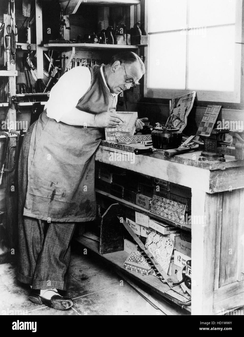 Stage and film actor Roger Imhof, at home in his workshop, 1934 Stock ...