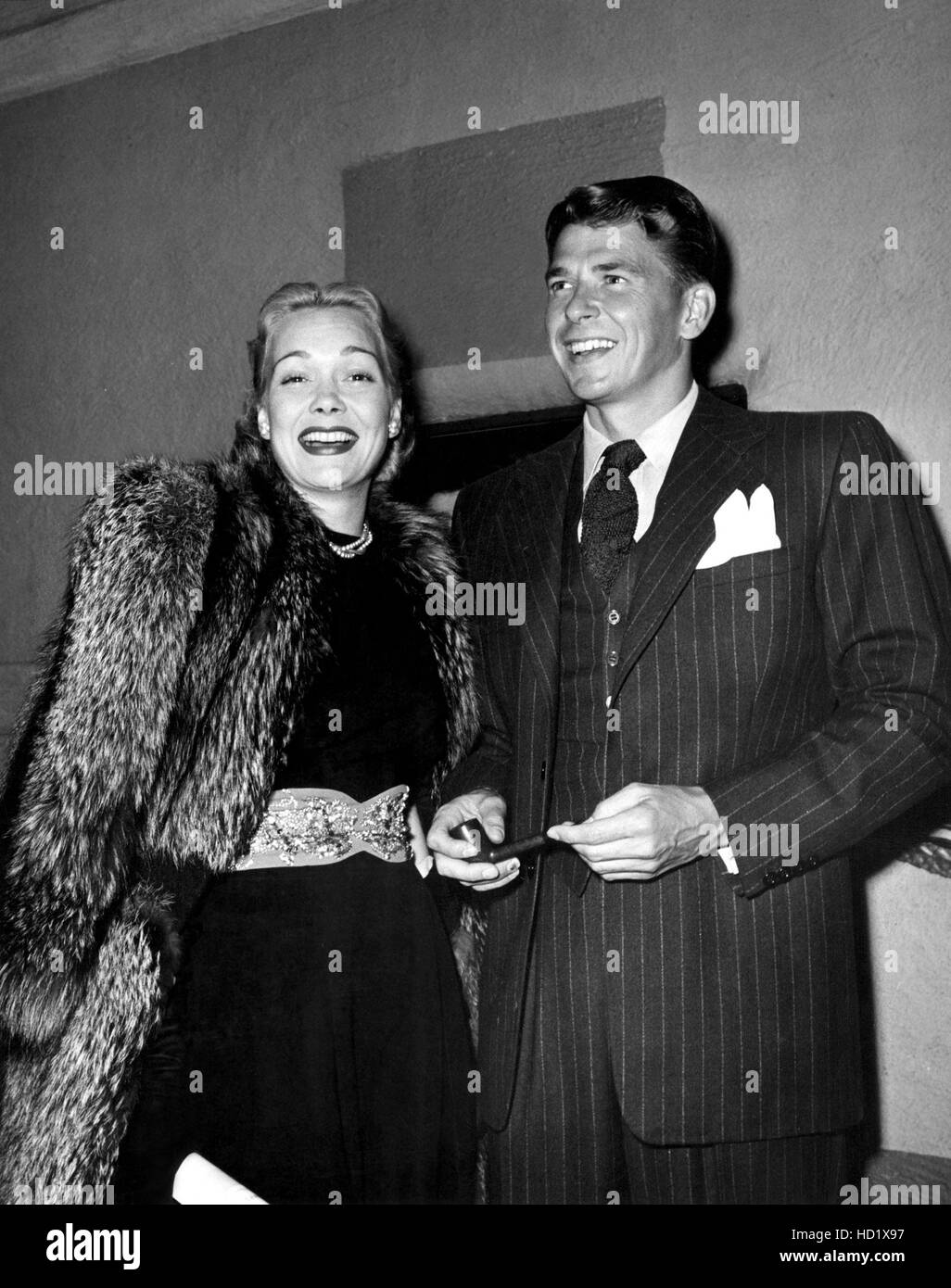 JANE WYMAN and husband RONALD REAGAN at the opening of the Ice Follies ...