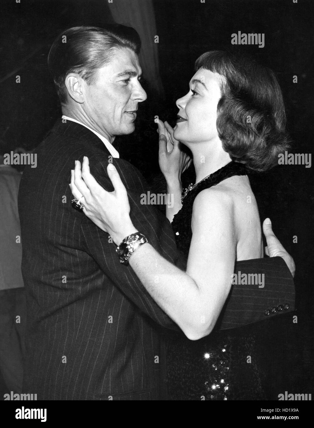 RONALD REAGAN and wife JANE WYMAN enjoy a dance during a night on the ...