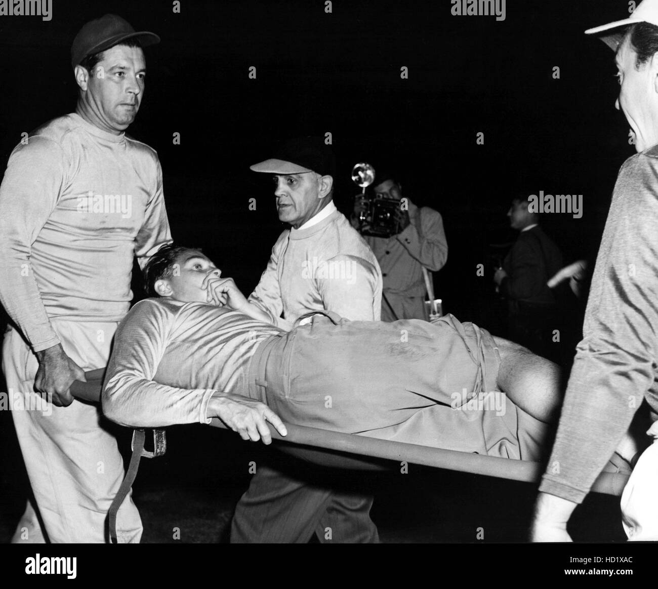 Ronald Reagan being carried from the field on a stretcher after ...