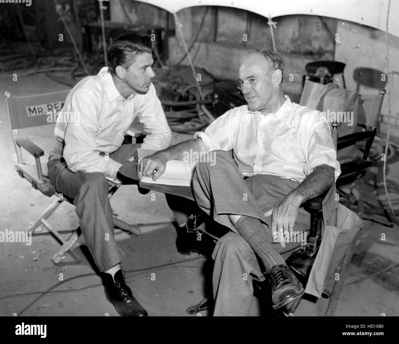 Ronald Reagan, Sam Wood on the set of KINGS ROW, 1942 Stock Photo - Alamy