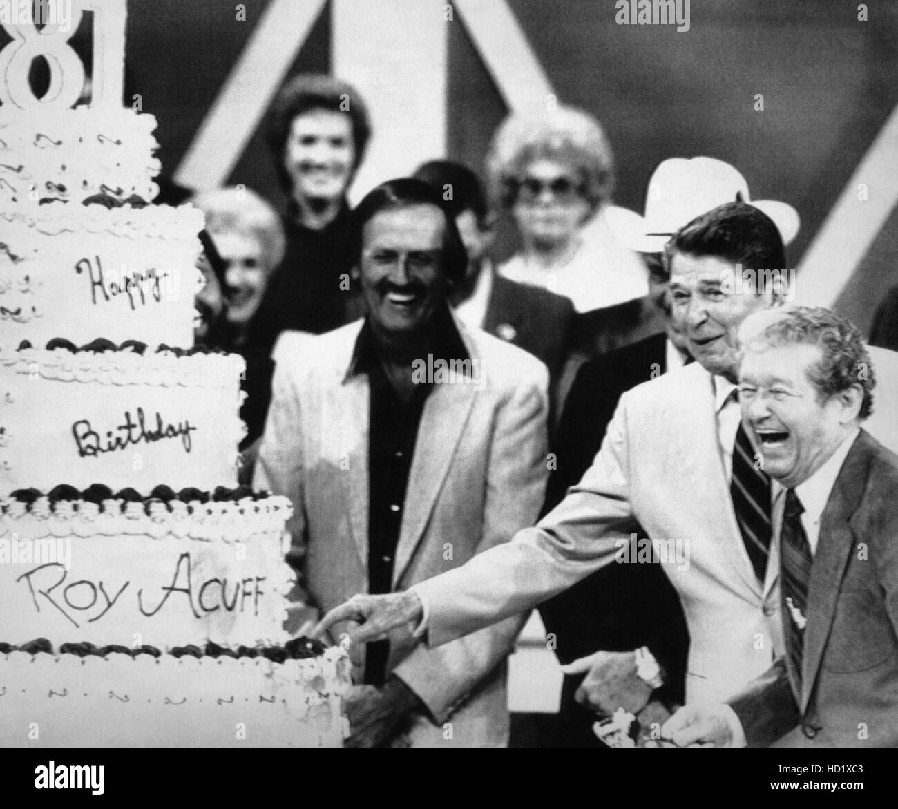 President Ronald Reagan, second from right, helps celebrate birthday of ...