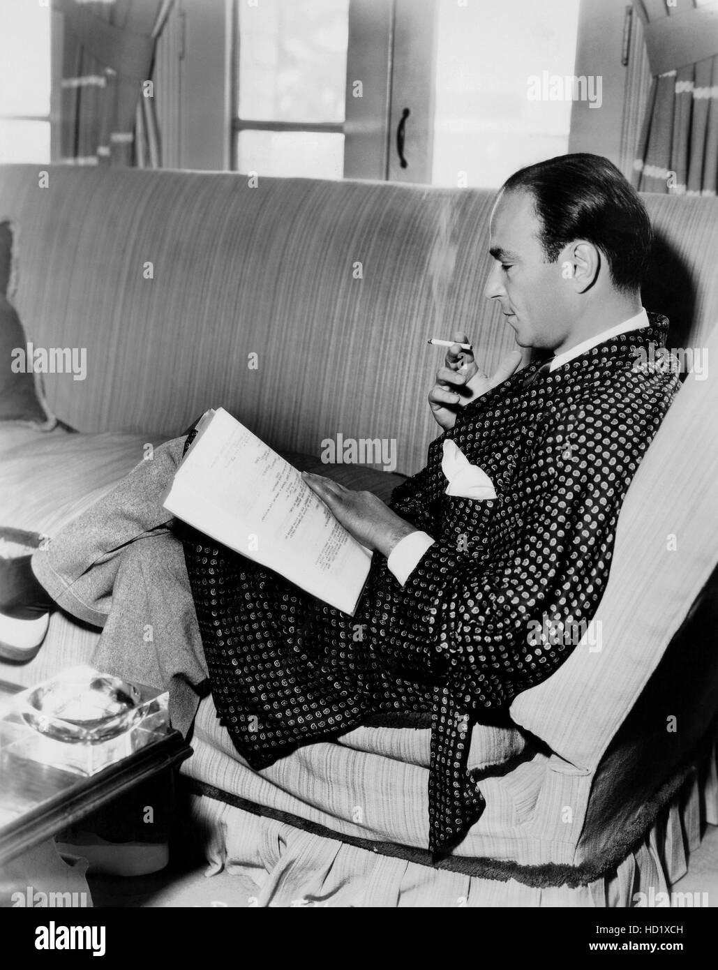 Robert Riskin, going over his screenplay for LOST HORIZON, 1937 Stock ...