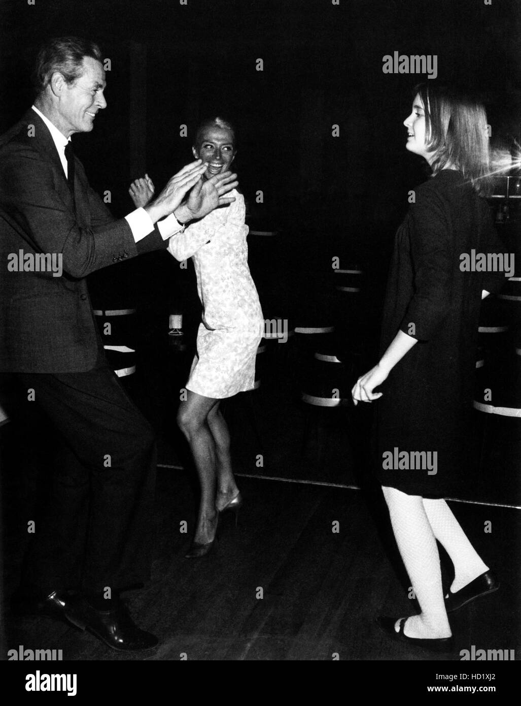 Robert Ryan, (left), dances with his daughter Lisa Ryan, as actress ...